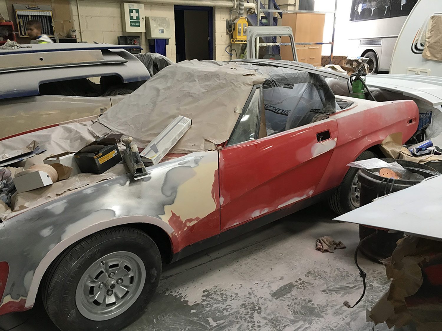 Craig is working on the TR7 body preparation today... - Bridge Classic Cars