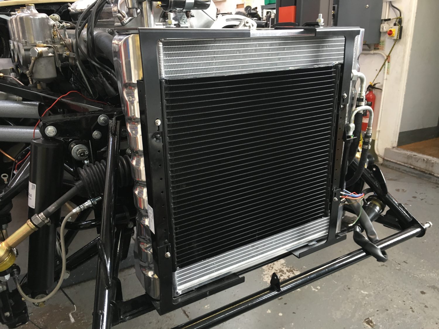 Fitting the new aluminium radiator and header tank - Bridge Classic Cars