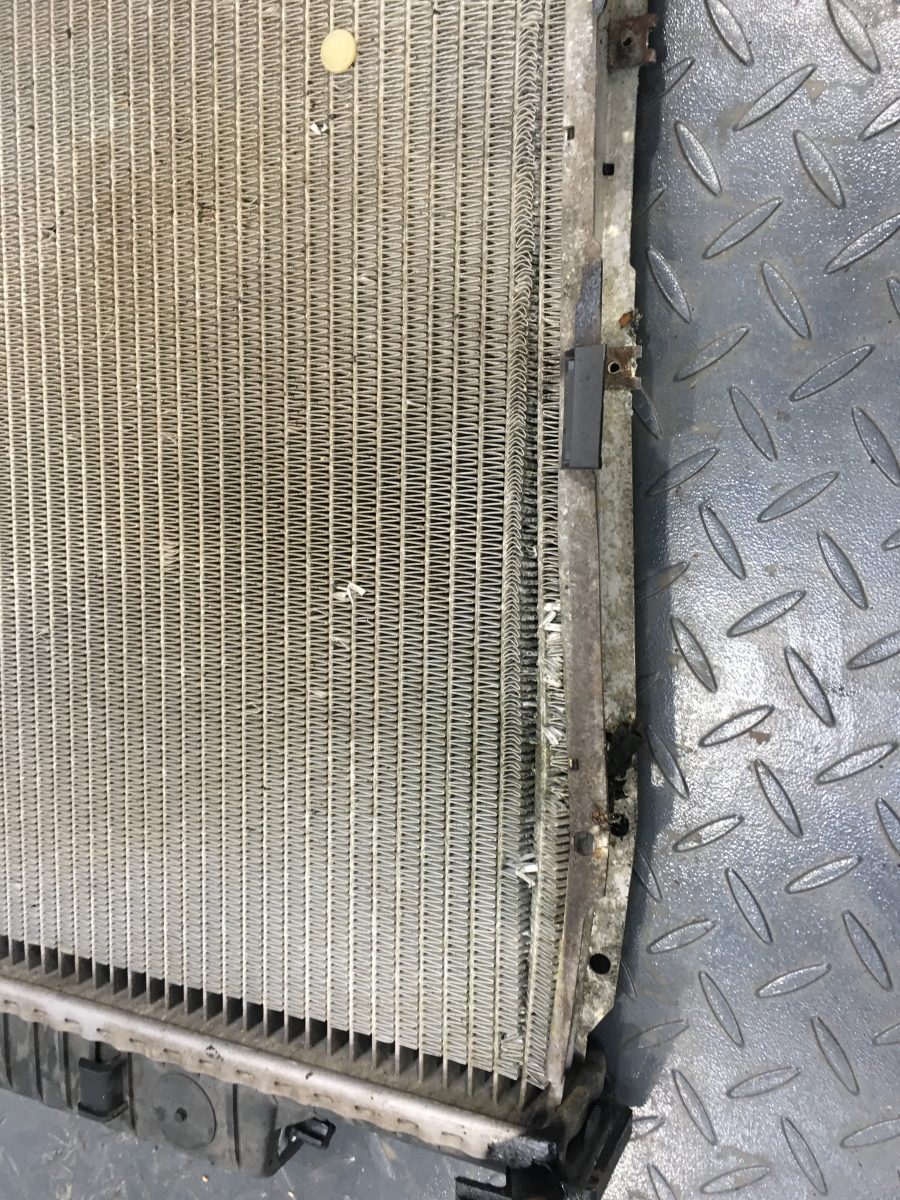 Replacing the damaged BMW 840 radiator - Bridge Classic Cars